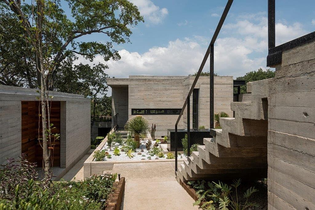 Casa AYG: A Testament to Sustainable Architecture | HomeAdore